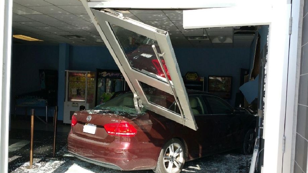 Car crashes through door and windows of University Mall Theatres in ...